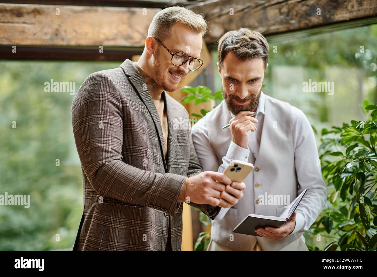 happy attractive business leaders with glasses in elegant attires ...