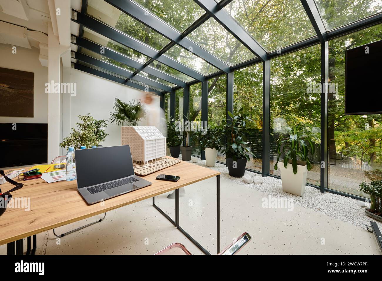 long exposure picture of diligent coworkers moving around their office ...