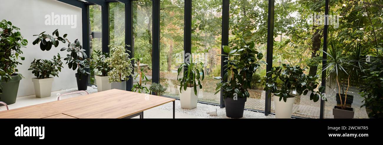 interior photo of modern minimalist meeting room with tables and green ...