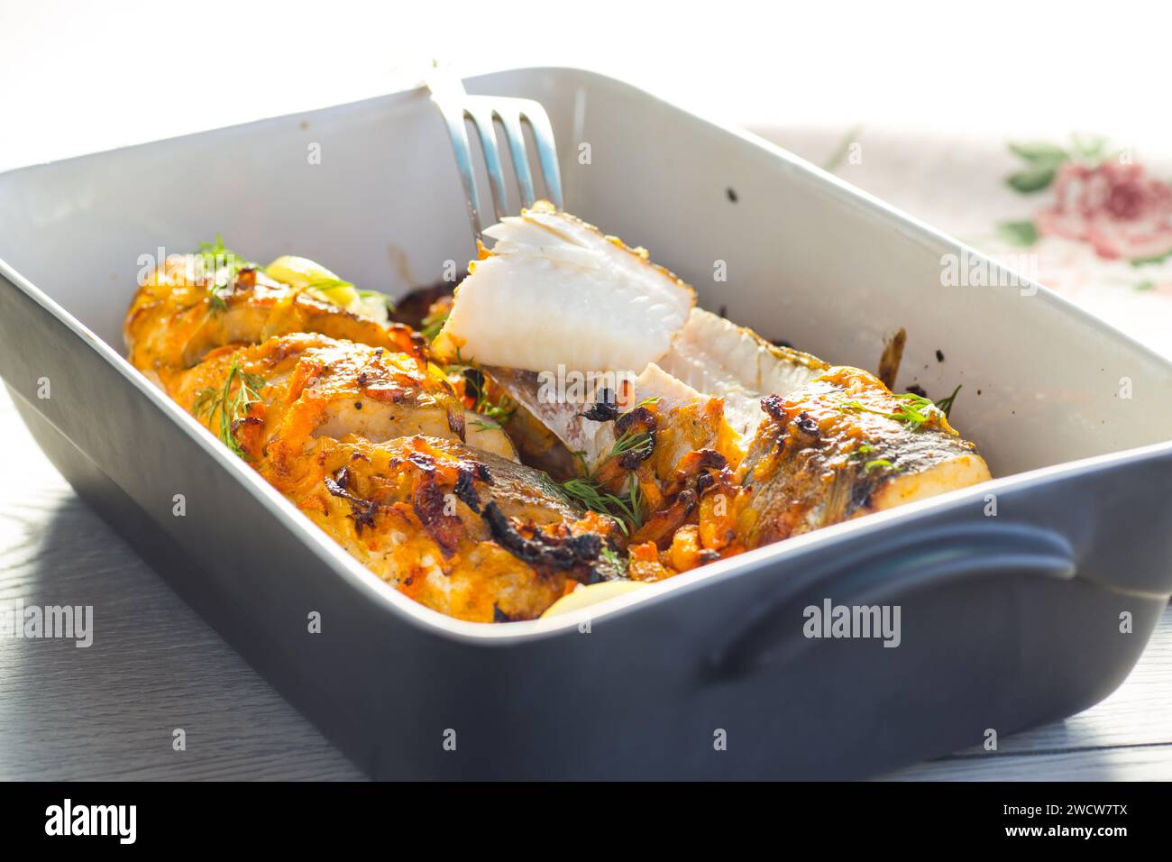 Baked trout fish vegetables hi-res stock photography and images - Alamy
