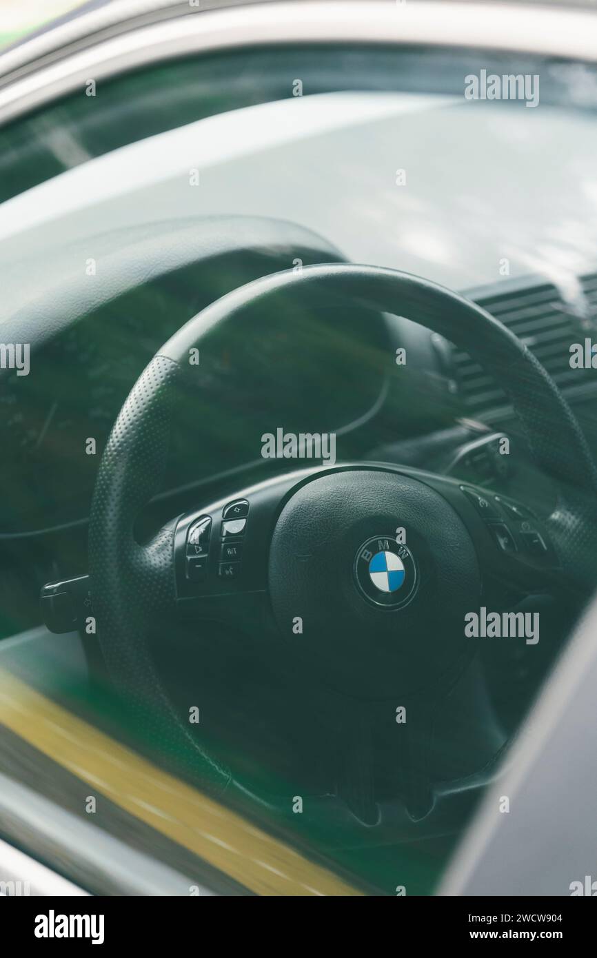 Car steering wheel through the window Stock Photo - Alamy
