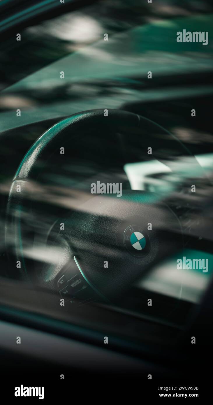 Car steering wheel through the window Stock Photo - Alamy