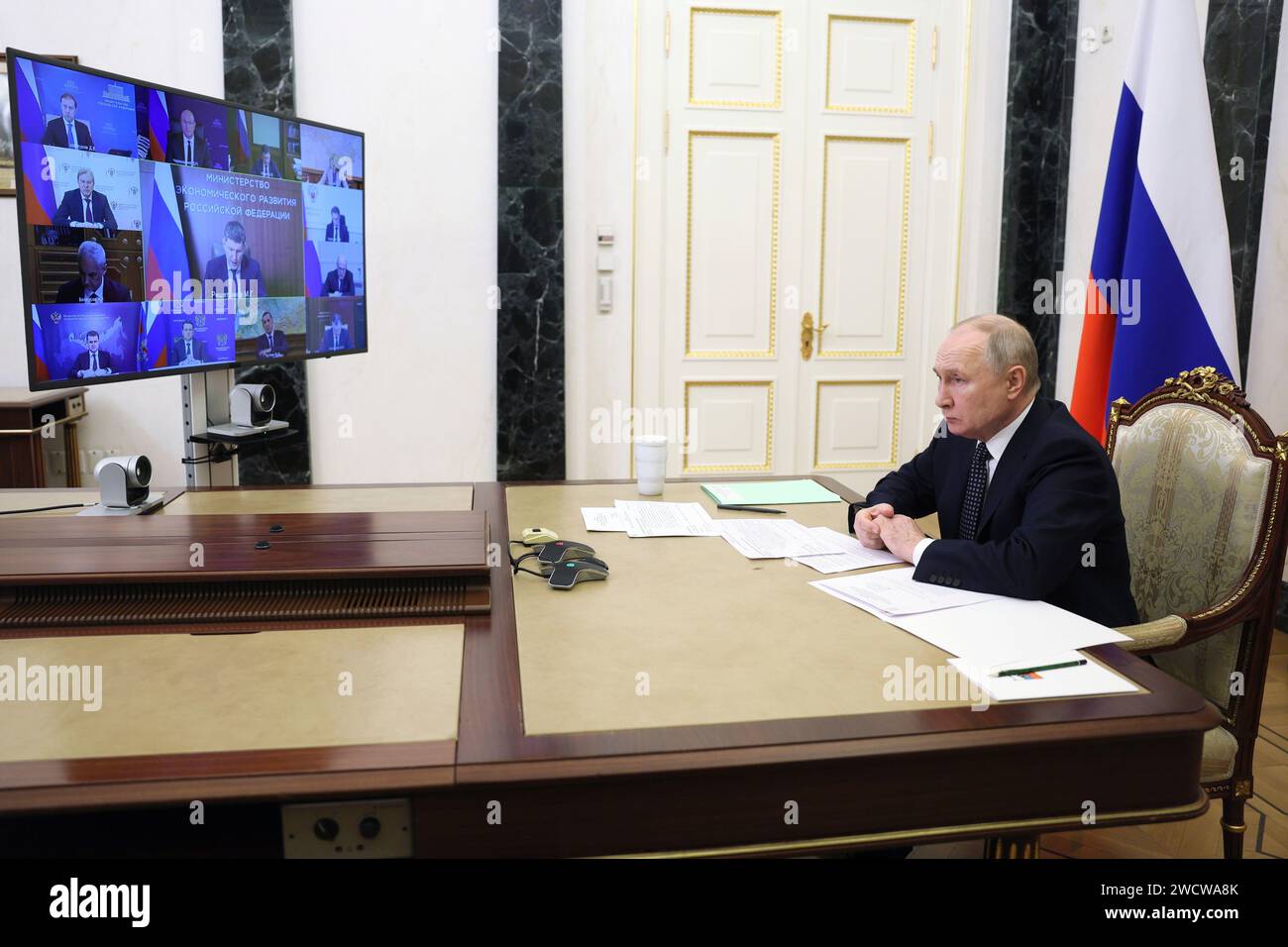 Russian President Vladimir Putin leads a cabinet meeting via ...