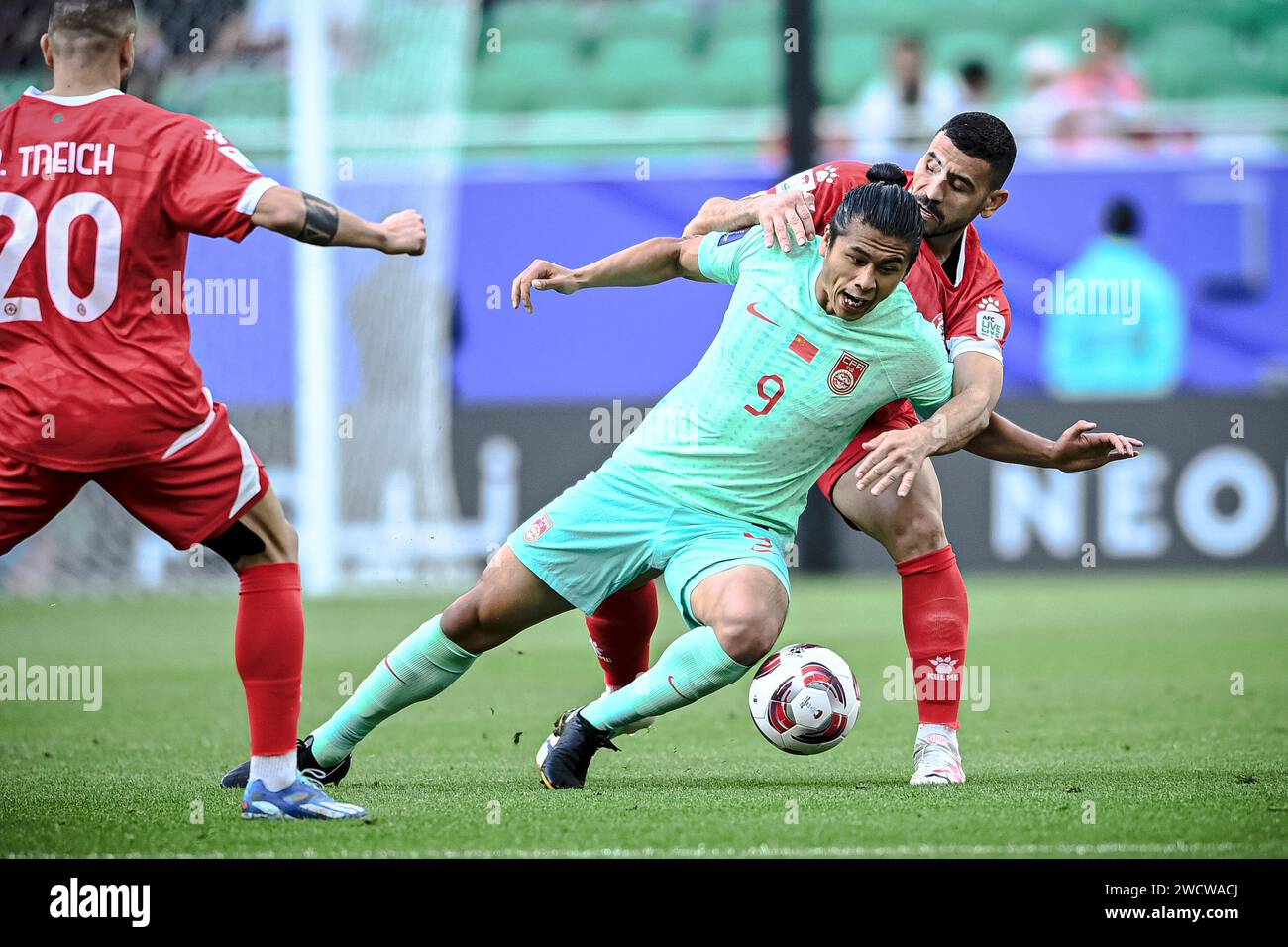 Doha, Qatar. 17th Jan, 2024. Zhang Yuning (C) of China competes during ...