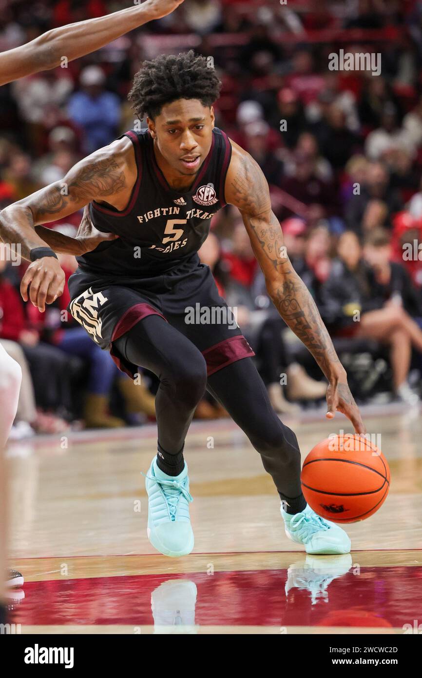 January 16, 2024: Aggies guard Eli Lawrence #5 drives the ball into the ...