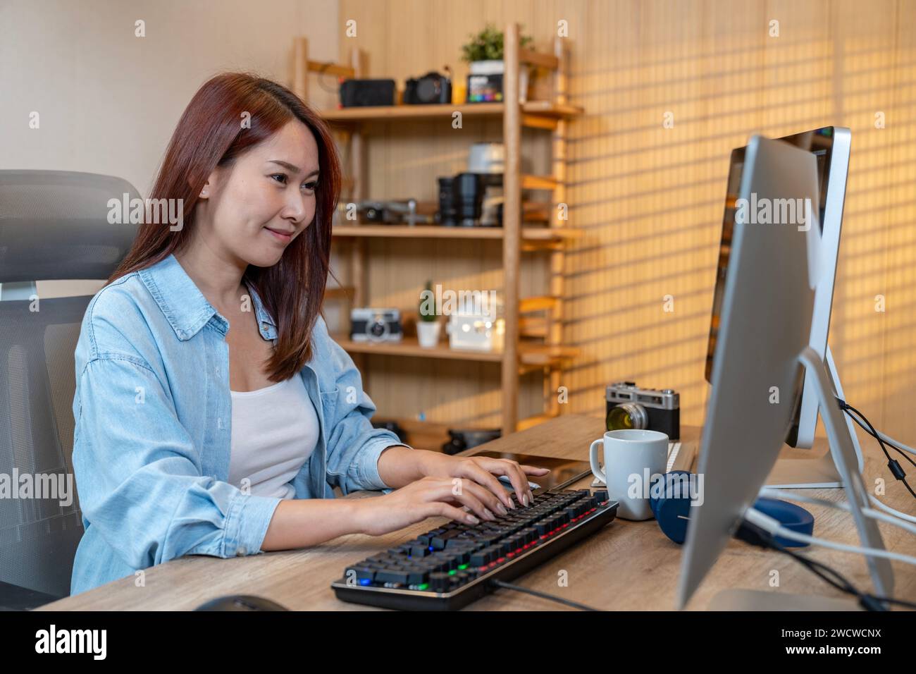 Asian female video editor hi-res stock photography and images - Alamy