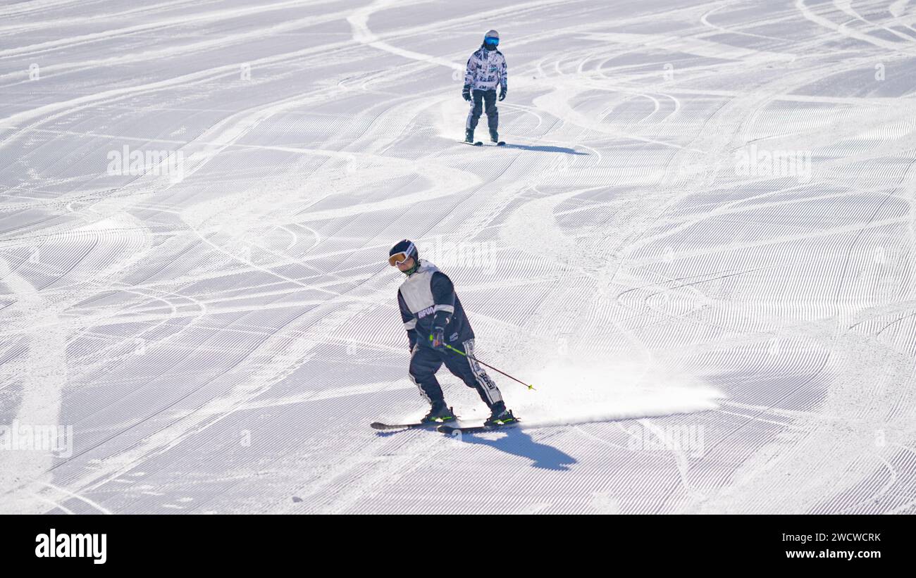 Xining, China's Qinghai Province. 1st Jan, 2024. People ski at a ski ...