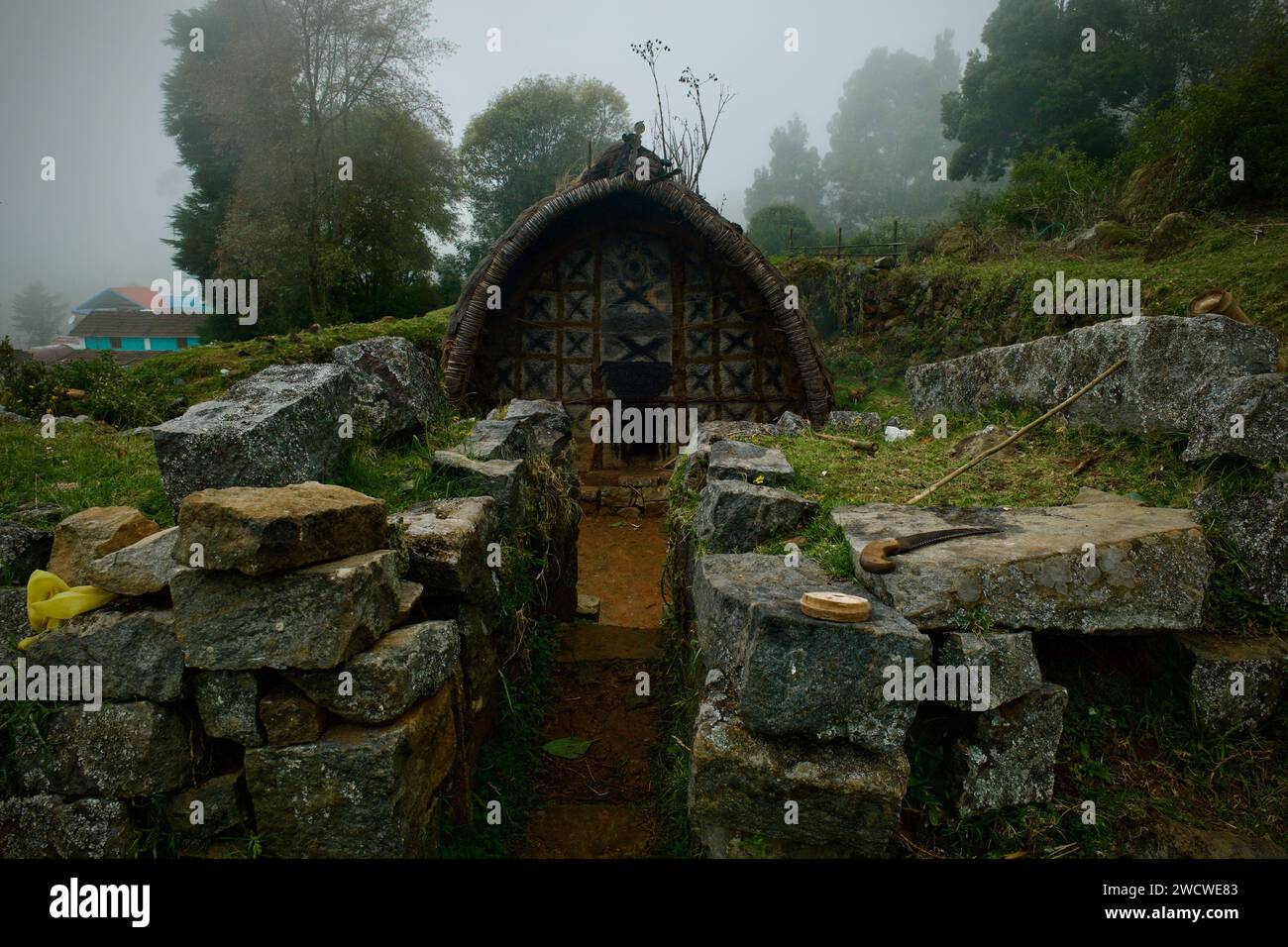 A quaint Toda tribe hut in a rocky landscape. Tamil Nadu, India Stock ...