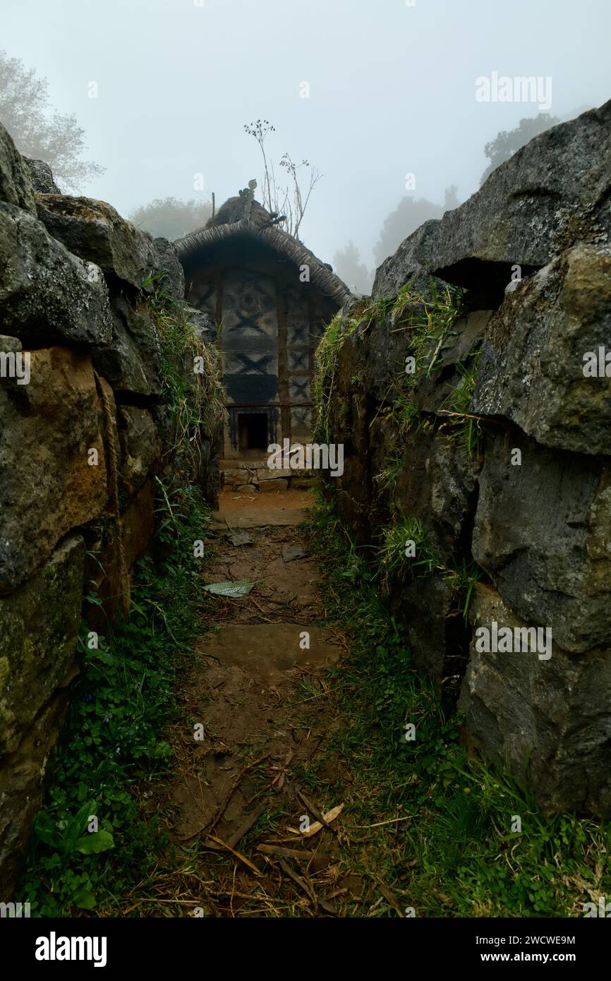 A quaint Toda tribe hut in a rocky landscape. Tamil Nadu, India Stock ...