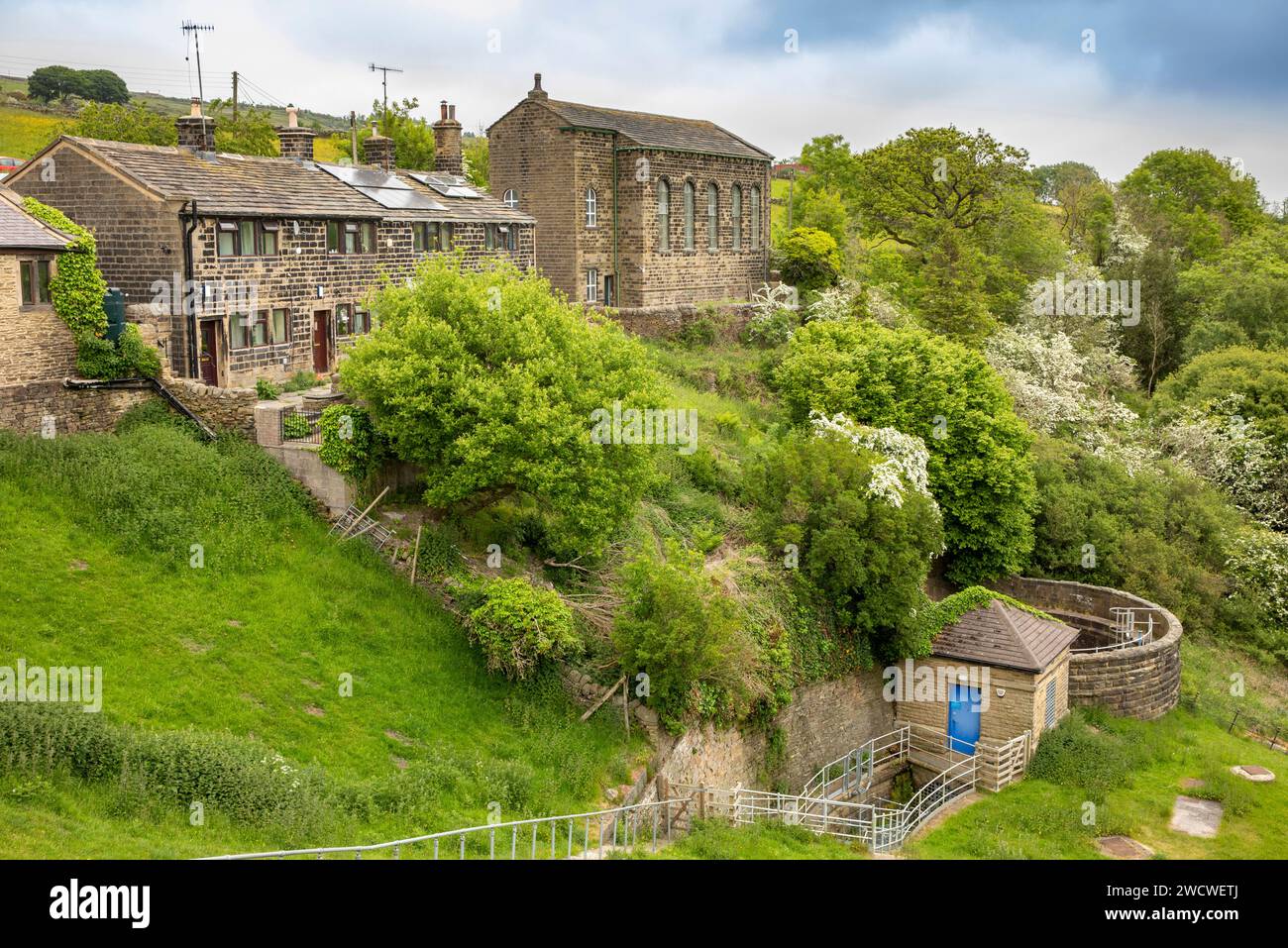 UK, England, Yorkshire, Ponden, Sunday School and houses above ...