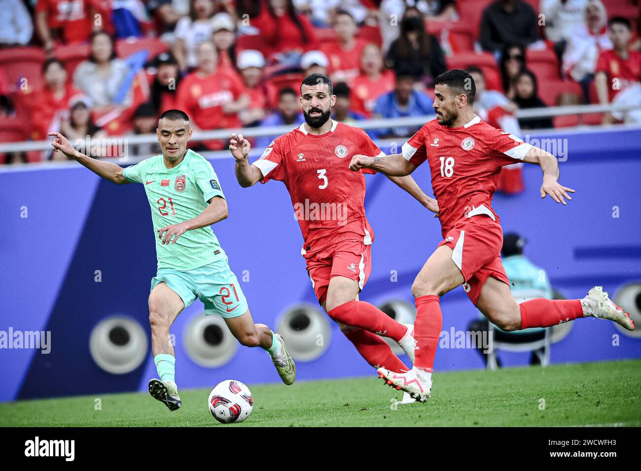 Doha, Qatar. 17th Jan, 2024. Liu Binbin (L) of China competes during ...