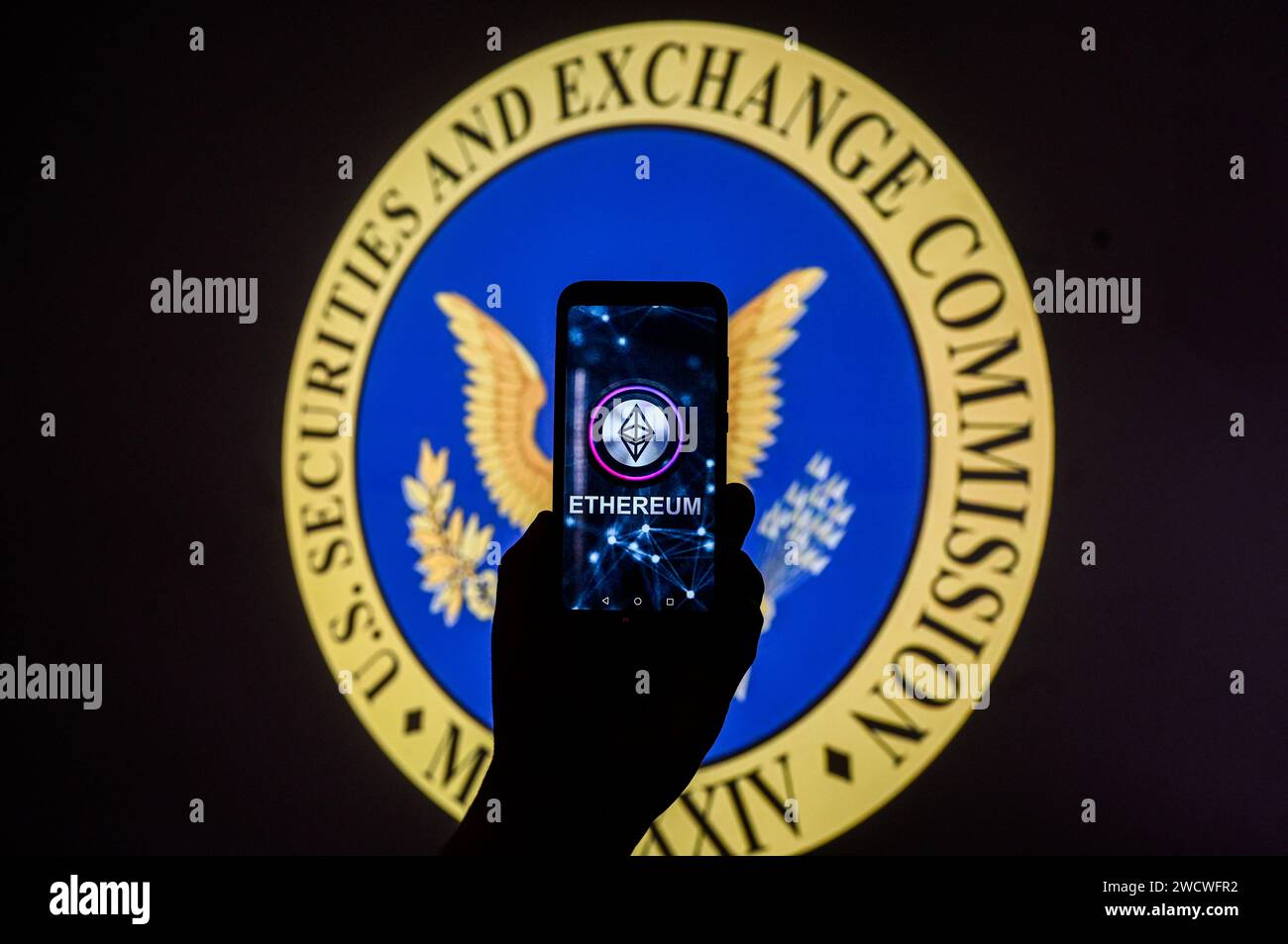 In this photo illustration, an Ethereum logo is displayed on a ...