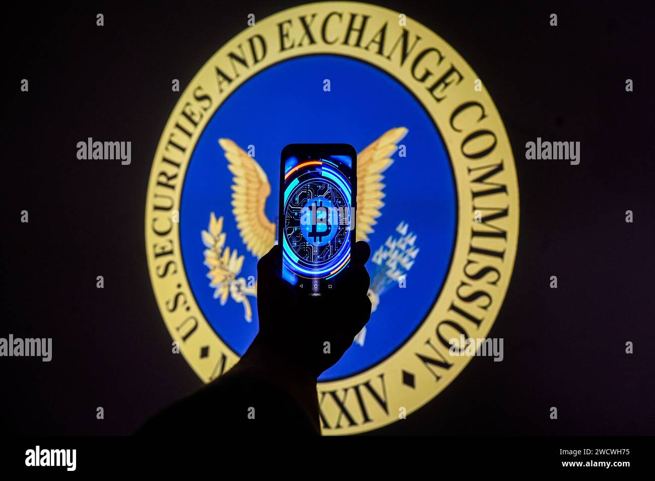 In this photo illustration, a Bitcoin logo is displayed on a smartphone ...