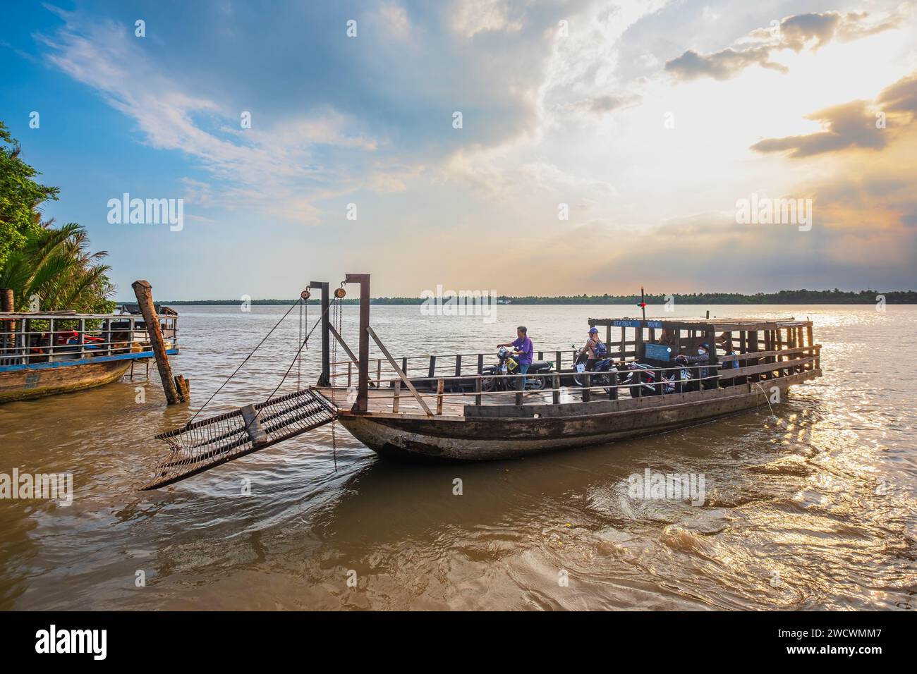 Vietnam, Mekong Delta, Ben Tre province, ferry on Ham Luong river Stock ...