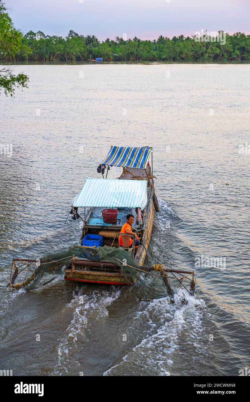 Vietnam, Mekong Delta, Ben Tre province, fisherman on Ham Luong river ...