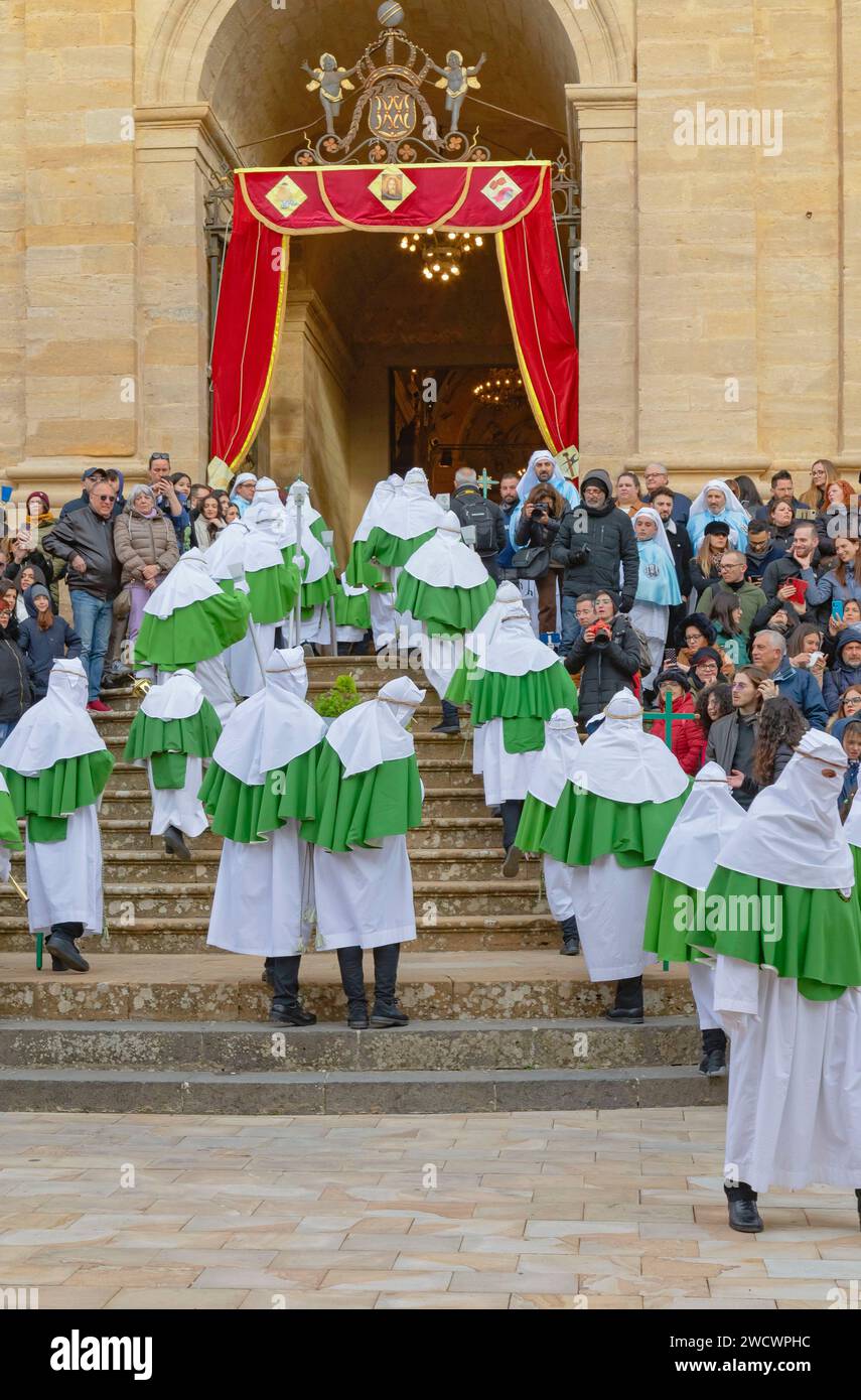 Italy, Sicily, Enna, Good Friday procession entering the cathedral ...