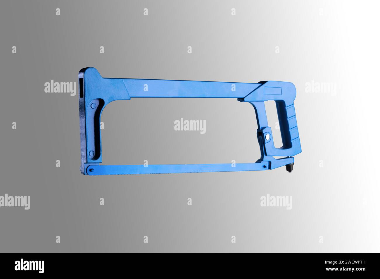 Blue hacksaw for metal. Isolated on a gray background Stock Photo - Alamy
