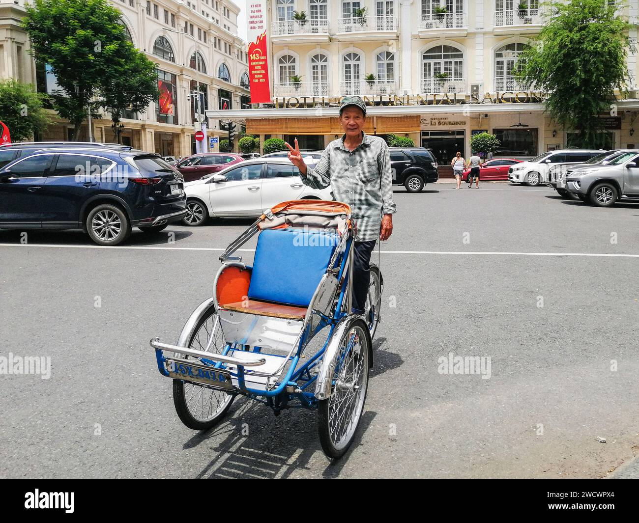 Vietnam, Saigon, rickshaw driver Stock Photo - Alamy