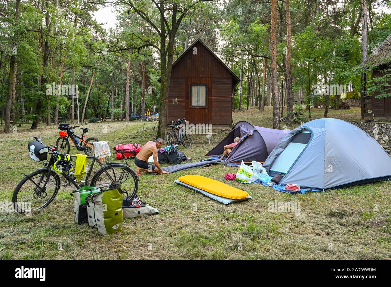 Europe; Euro Vélo 6, setting up the bivouac in a campsite in Hungary ...