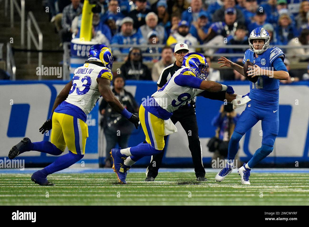 Detroit Lions quarterback Jared Goff (16) tries to avoid the tackle ...