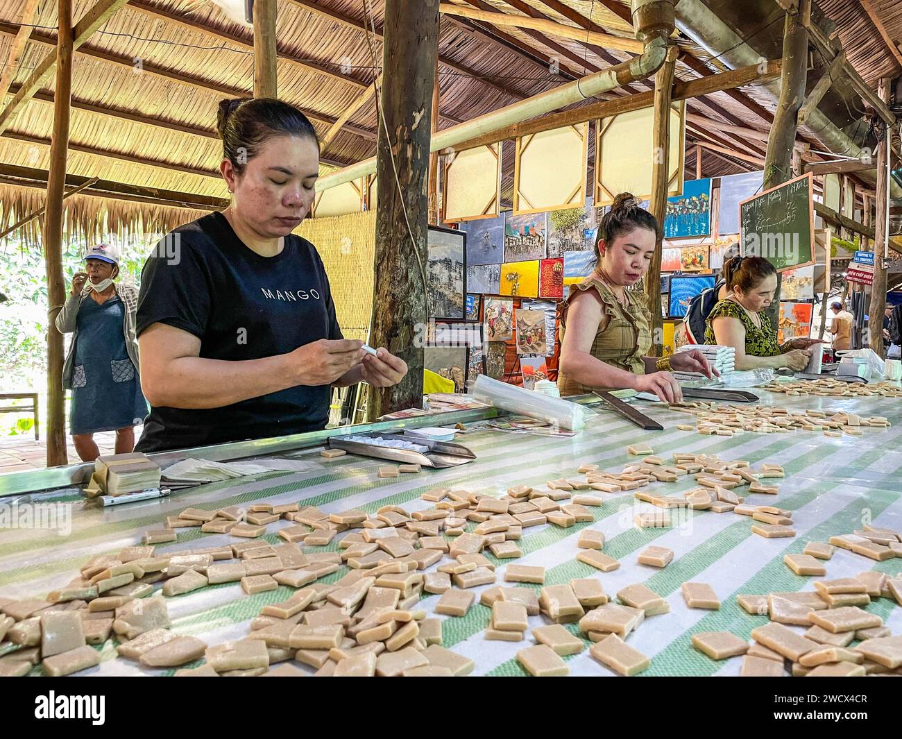 Vietnam, Mekong delta, small artisanal coconut candy factory Stock ...