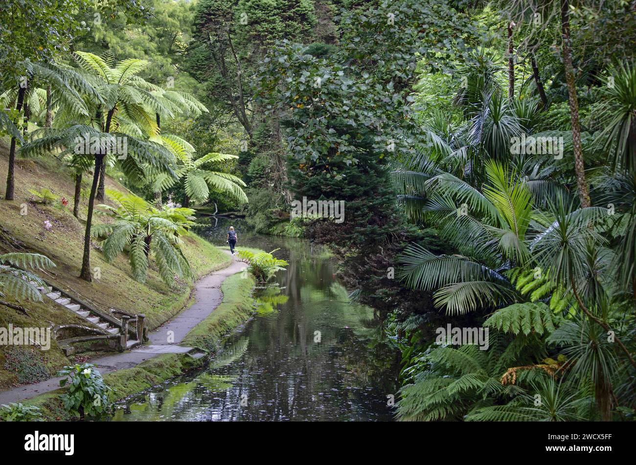 Portugal, Azores archipelago, Sao Miguel island, Furnas, woman walking ...