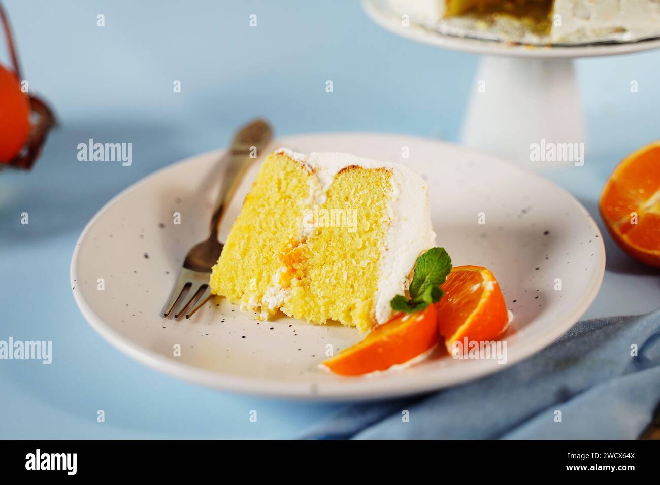 Homemade Mandarin orange cake with whipped cream frosting Stock Photo ...