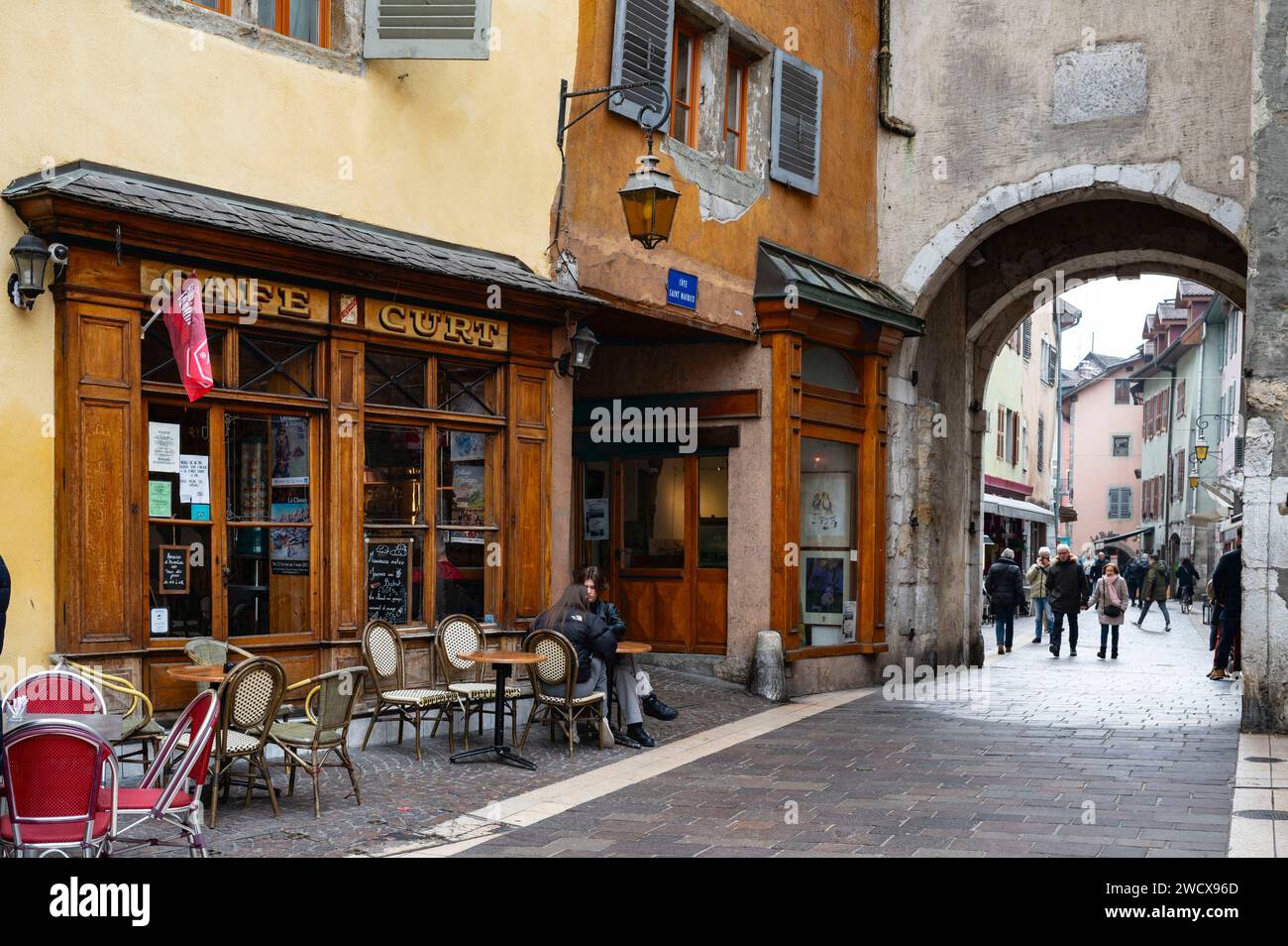 France, Haute Savoie, Annecy; the Curt café at the foot of the clock ...