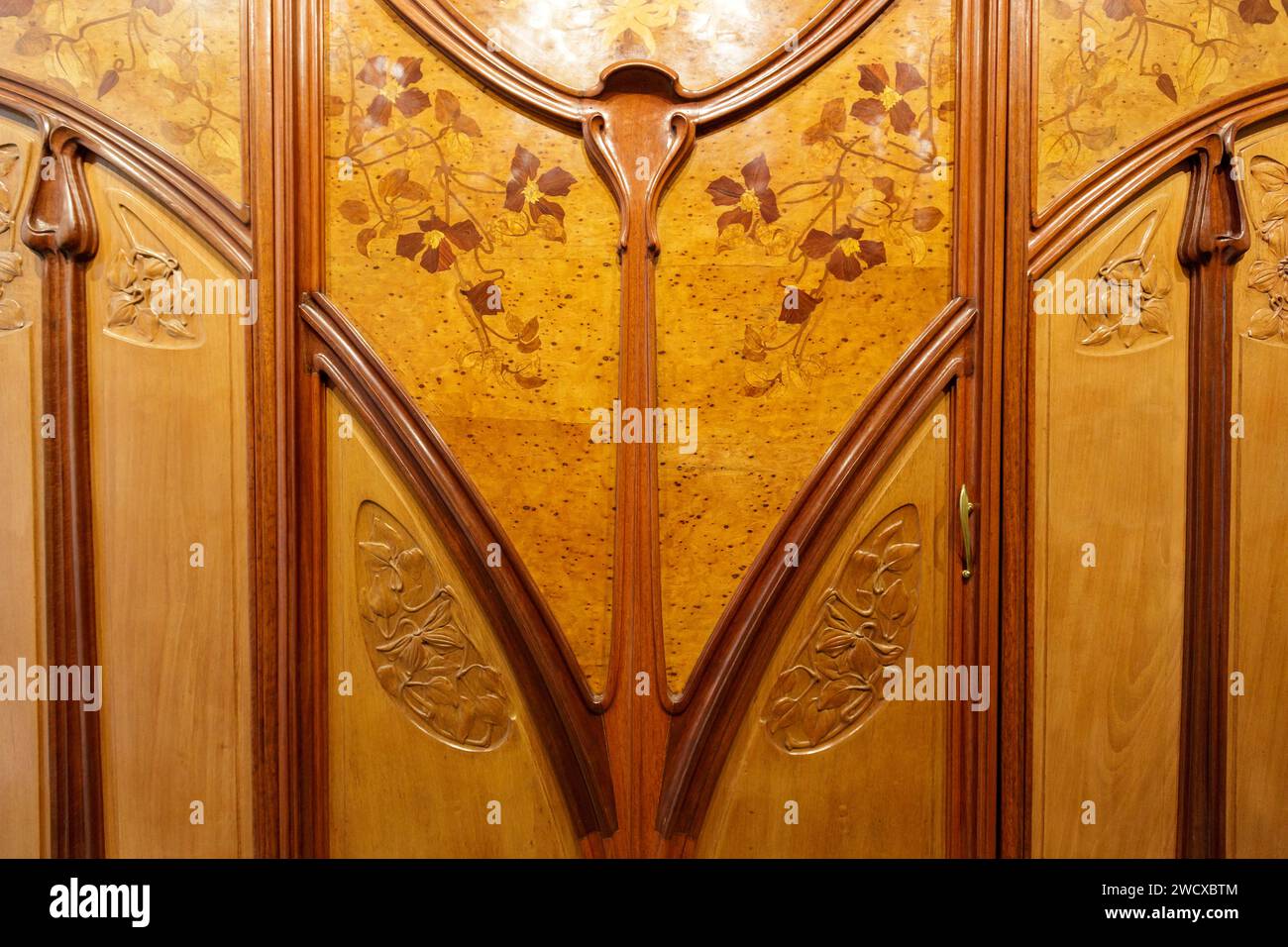France, Meurthe et Moselle, detail of a piece of furniture with a clock in Art Nouveau style ...
