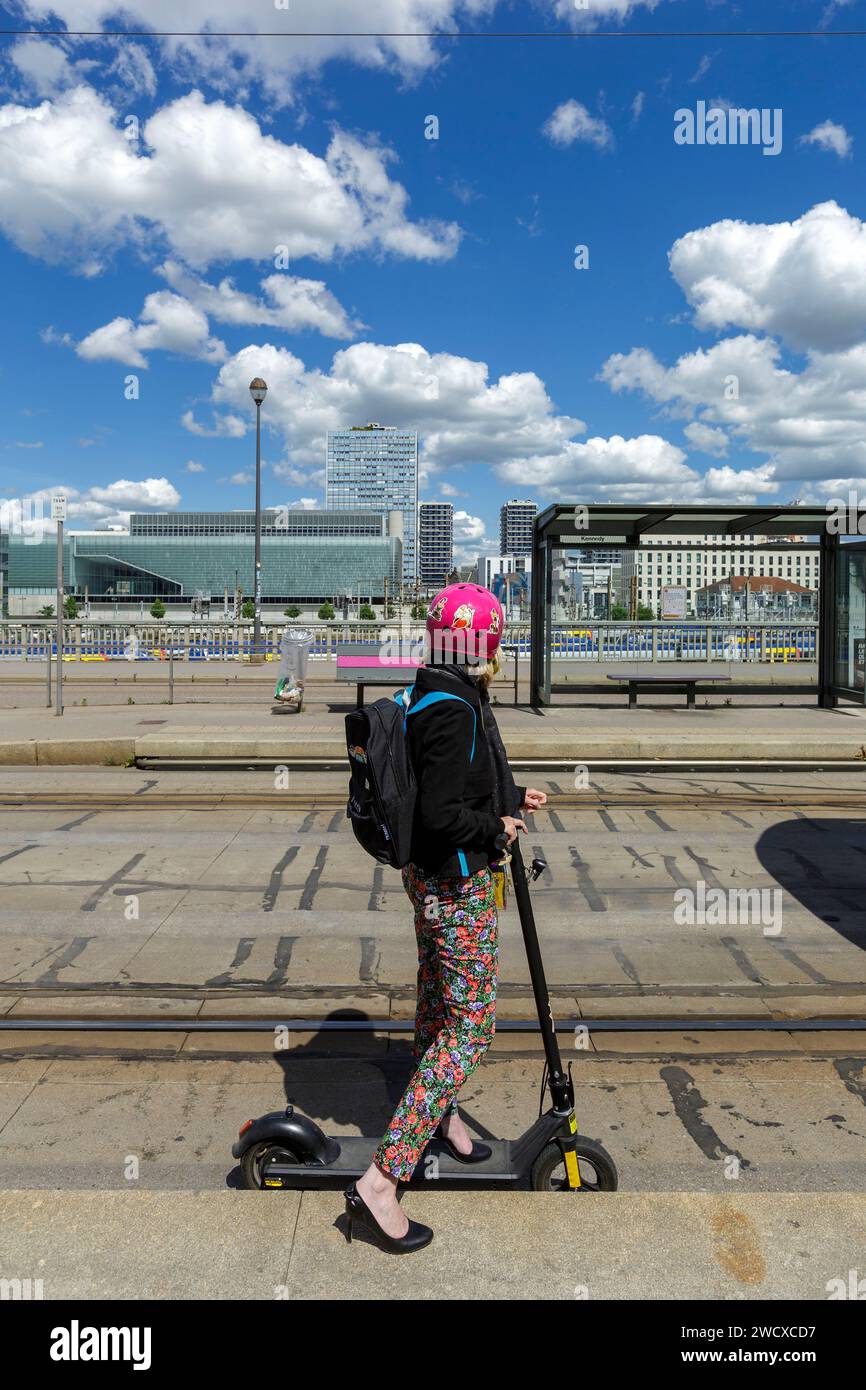 France, Meurthe et Moselle, Nancy, woman on an electric scooter on ...