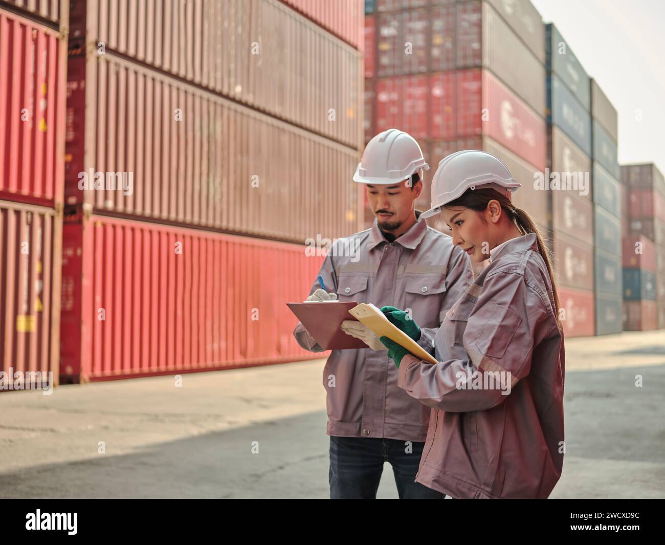 A Team Of Engineers Talks To Managers At The Container Cargo Quality Inspection Work Plan
