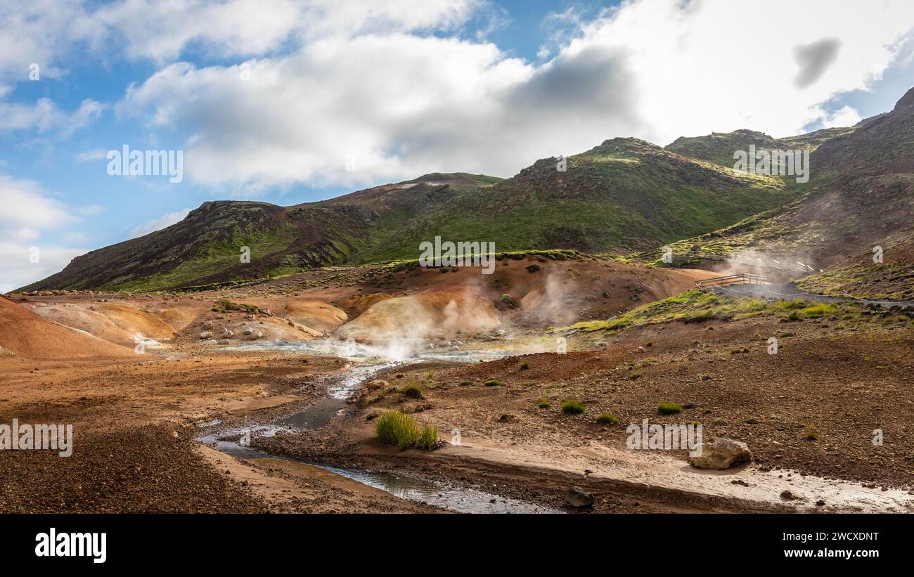 The active Krysuvik geothermal area with its brown earth, dramatic ...