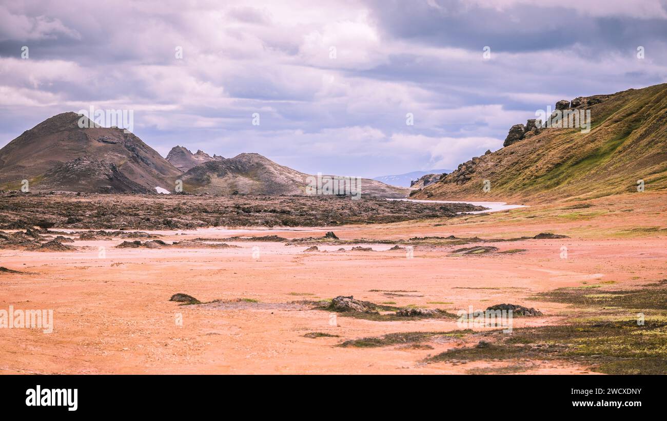 The active geothermal area of Hveraroend with its red earth and green ...