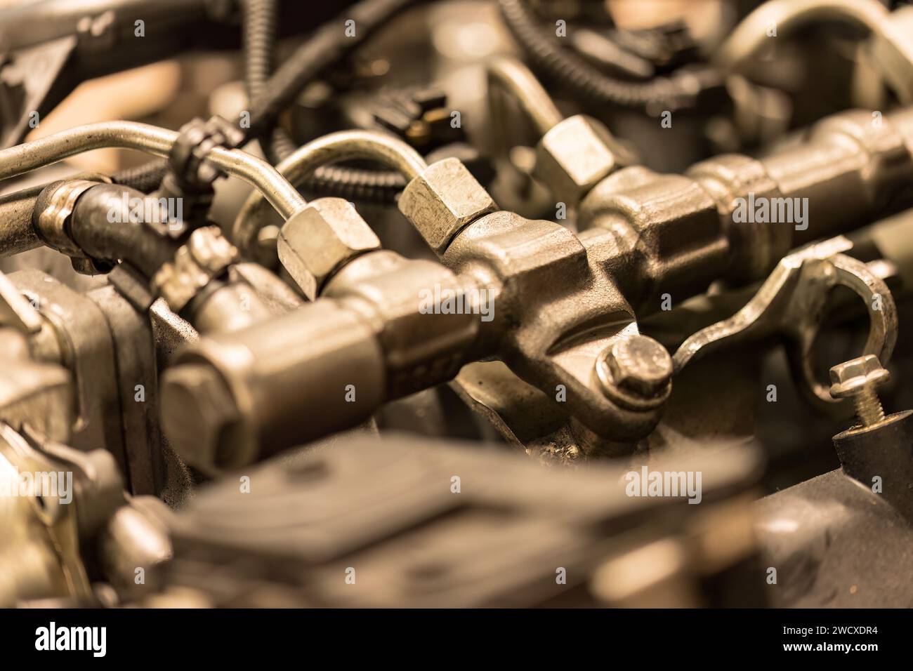Close-up photo of common rail diesel injectors, highlighting the ...