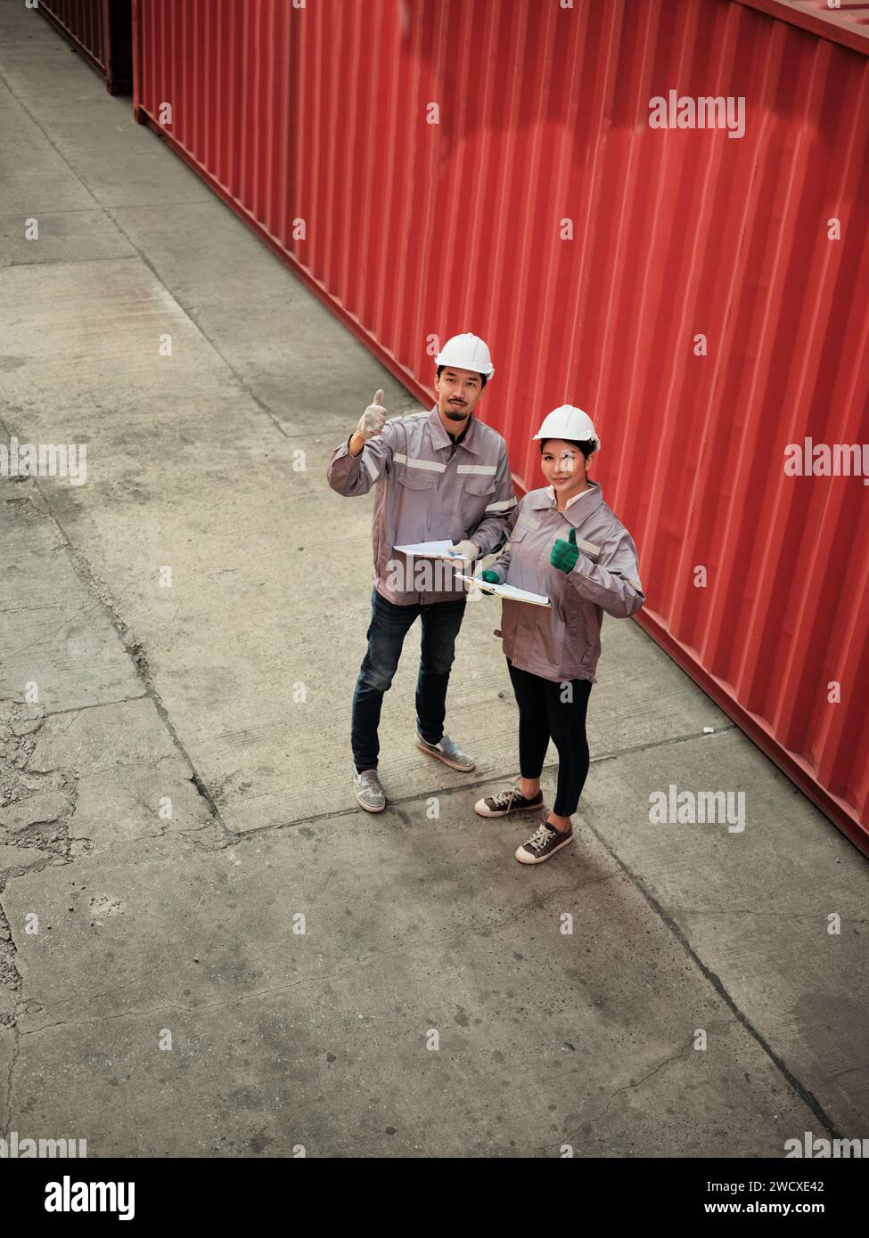 A Team Of Engineers Showing Thumbs Up At The Container Cargo Concept Quality Inspection Work
