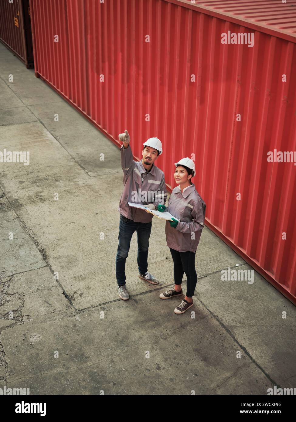 A Team Of Engineers Talks To Managers At The Container Cargo Quality Inspection Work Plan