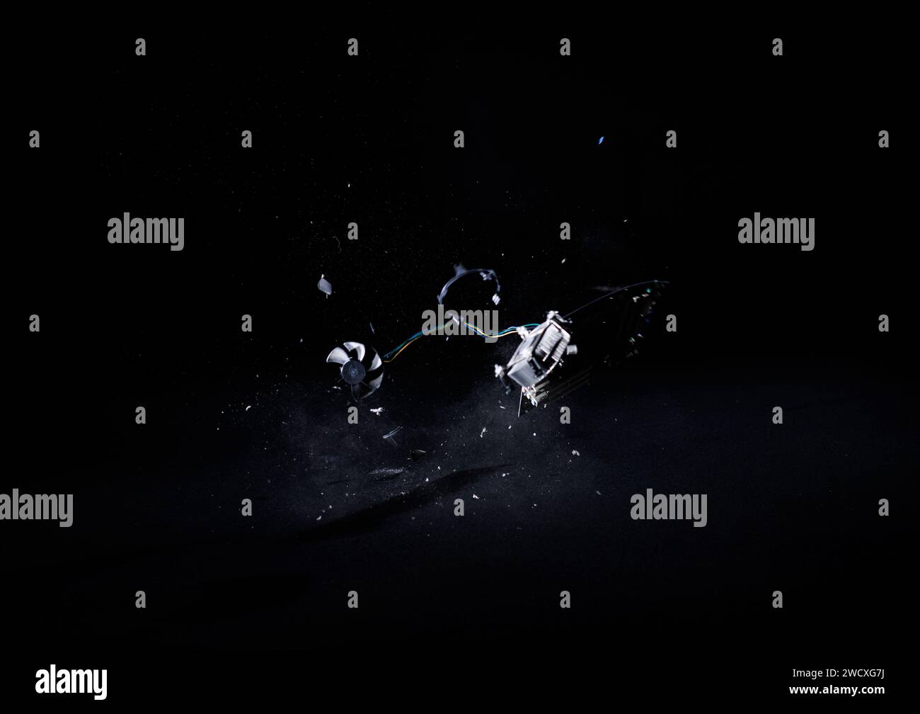 Male hands destroying and damaging computer motherboard, smashing it ...