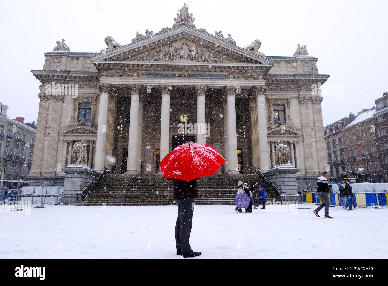 Brussels, Belgium. 17th Jan, 2024. People walk during a snowfall in ...