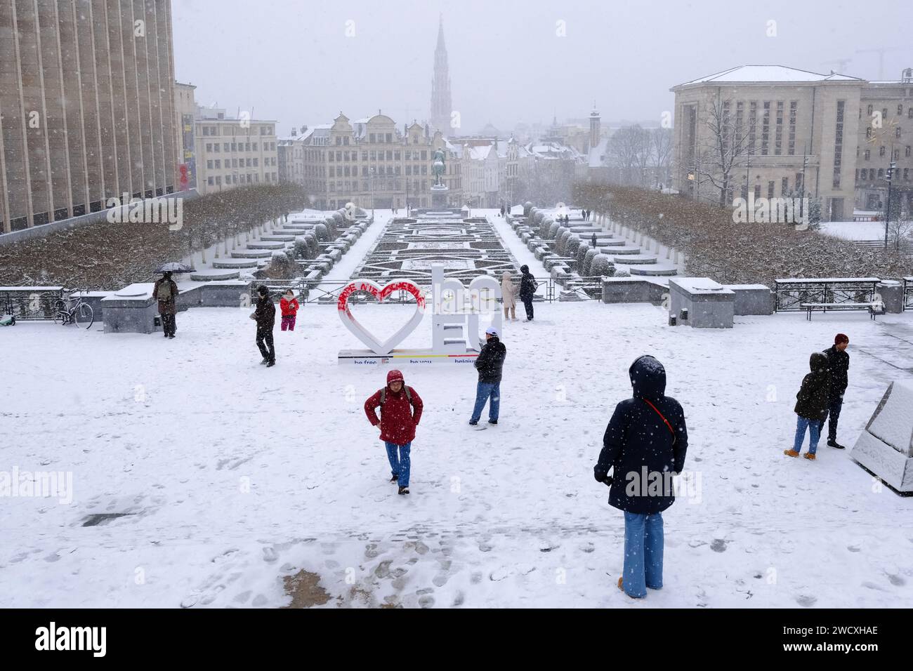 Brussels, Belgium. 17th Jan, 2024. People walk during a snowfall in ...