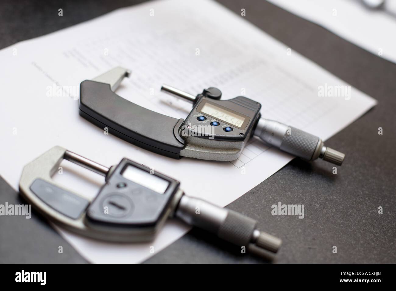 technician inspector using quality control tools in industry ...