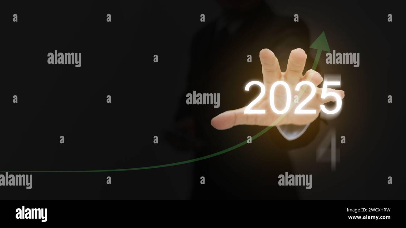 Happy new year 2025. A man reaches out his hand to take new ...