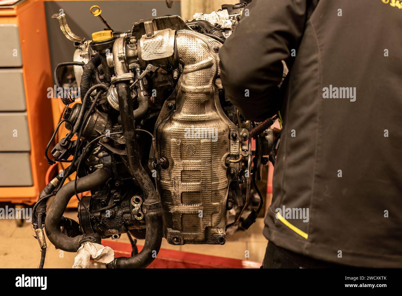 Close-up photo of a dismantled diesel engine's particulate filter ...