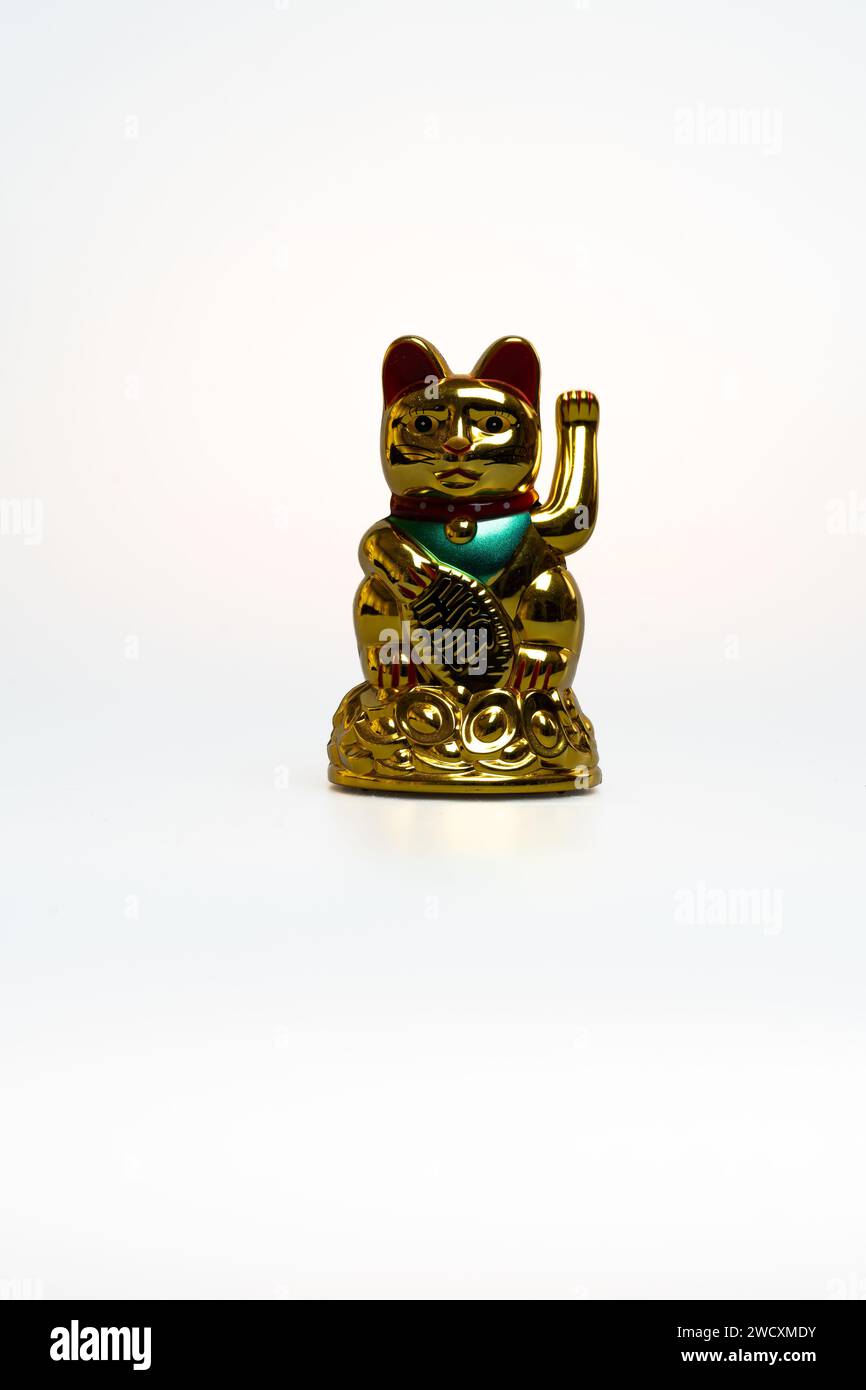 chinese cat, maneki neko on white background copy space Stock Photo - Alamy