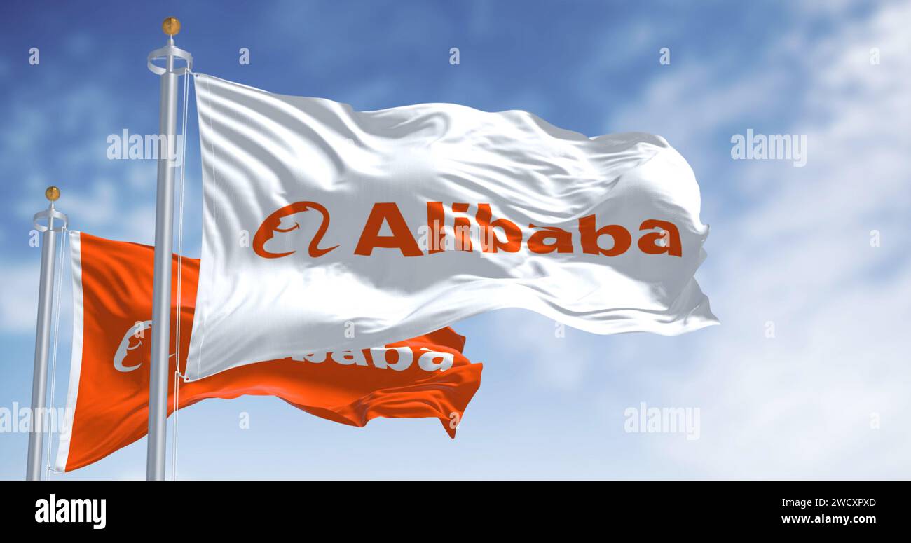 Hangzhou, CH, Jan. 12 2024: Flag with the Alibaba Group logo waving on ...