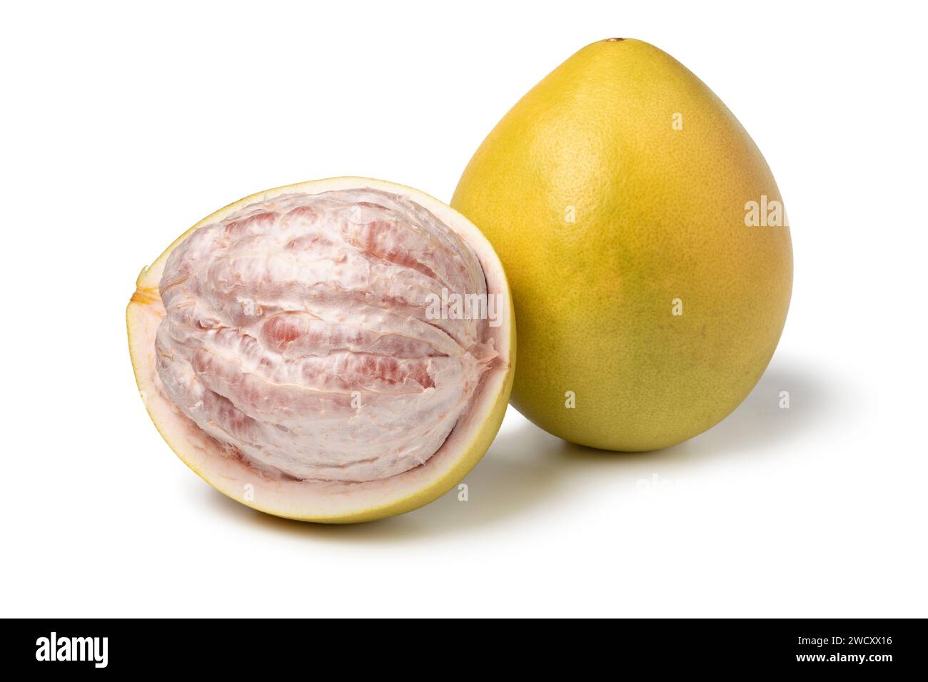 Whole fresh red Pomelo and peeled pomelo close up isolated on white ...