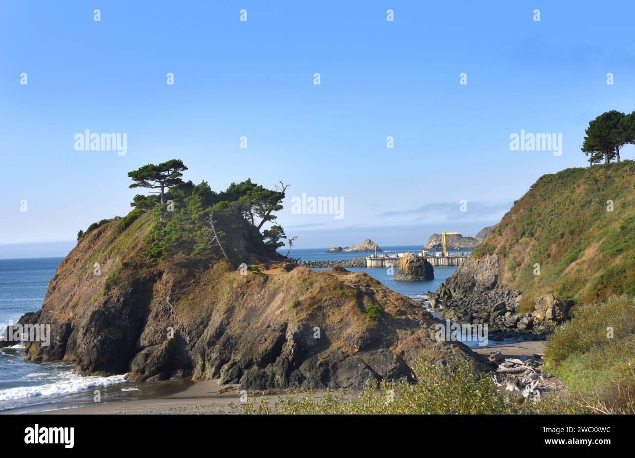 Battle Rock, historic landmark on the Oregon Coast, is in forefront of ...