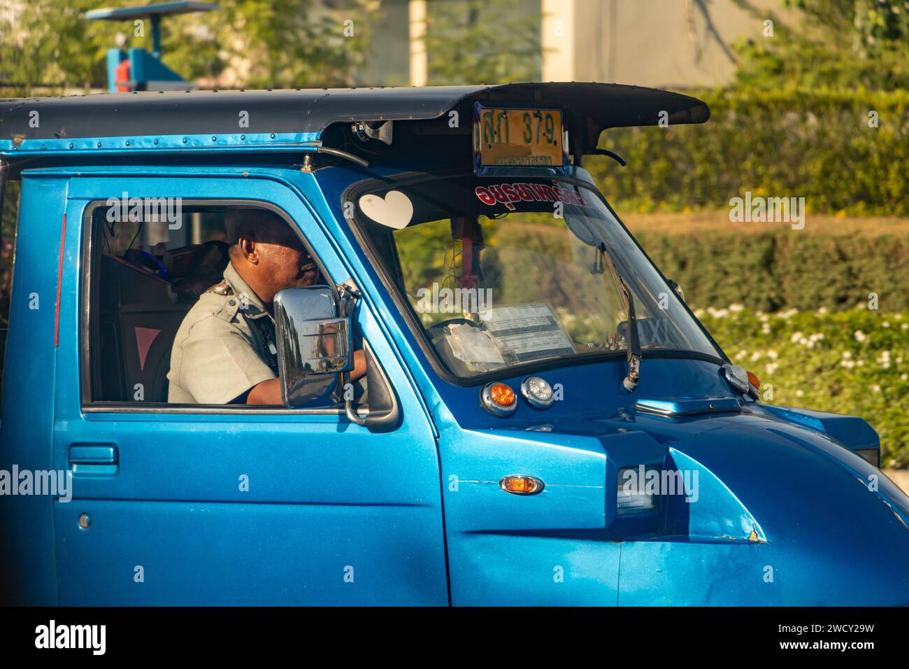 AYUTTHAYA, THAILAND, DEC 10 2023, A traditional taxi tricycle (tuk tuk ...