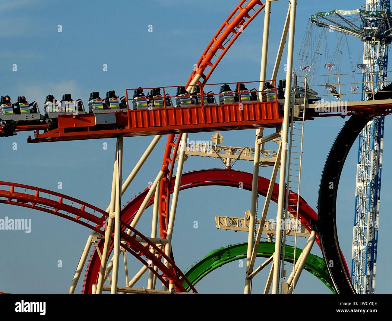 Munich, Oktoberfest skyline: carriages of the Olympic ring roller ...