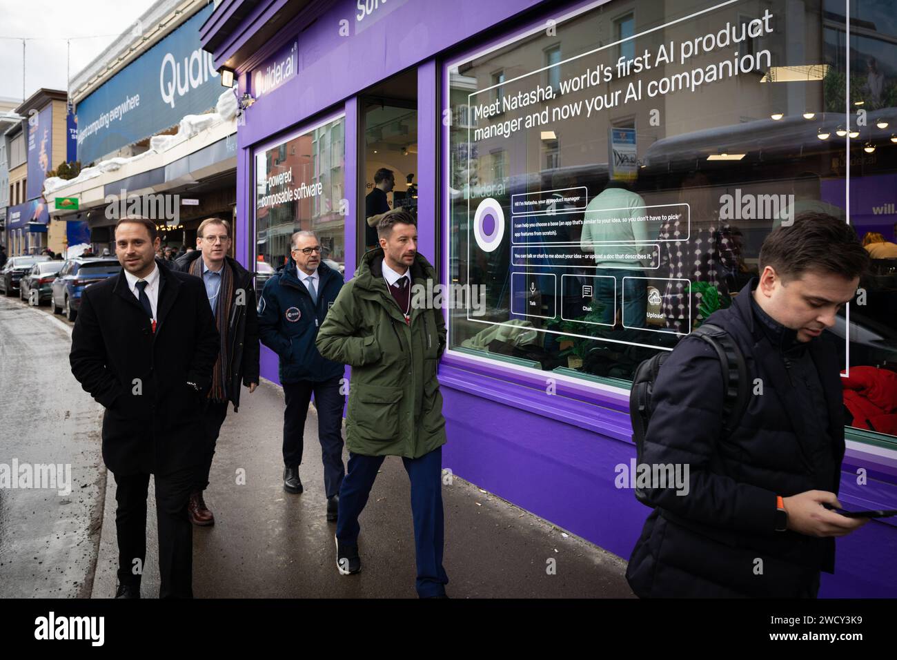 People walk past web development company, builder.ai. The main ...