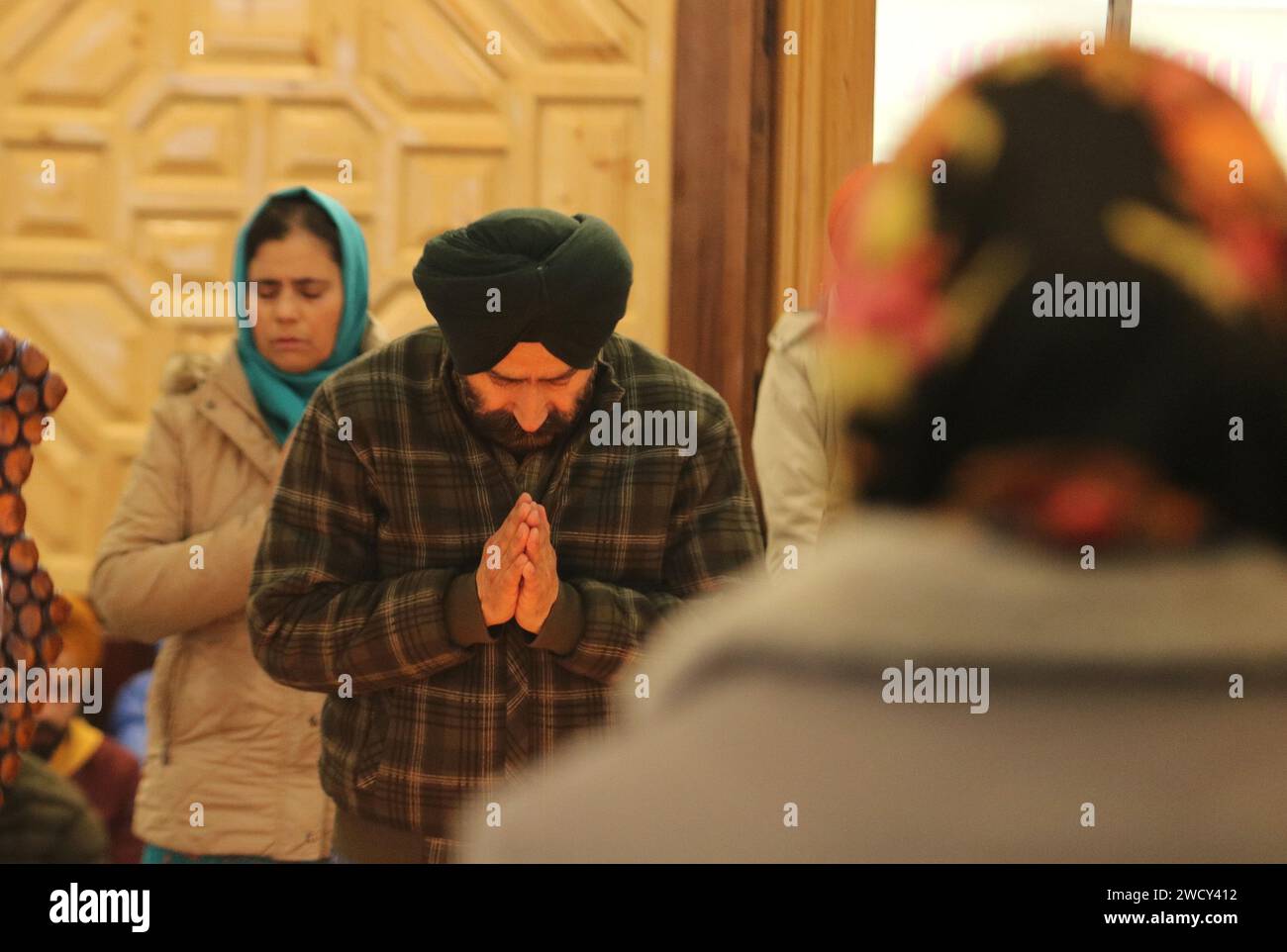 Srinagar Kashmir, India. 17th Jan, 2024. Indian Sikh devotees pray at Gurudwara on the occasion ...